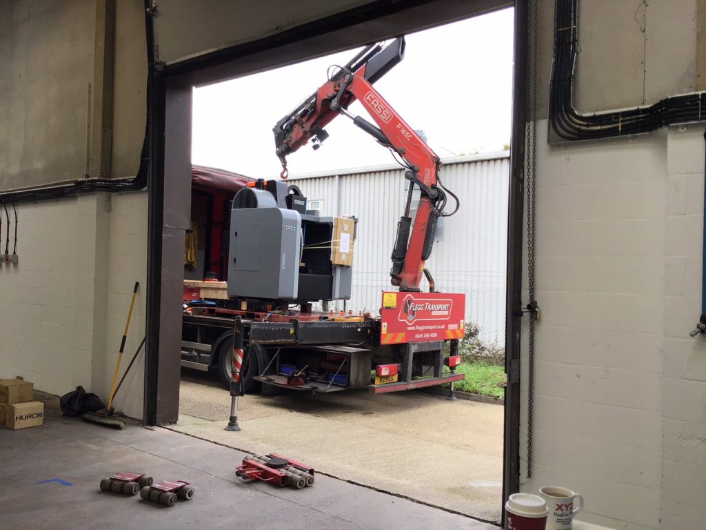 New machine arrives at MPC. - Machined Precision Components